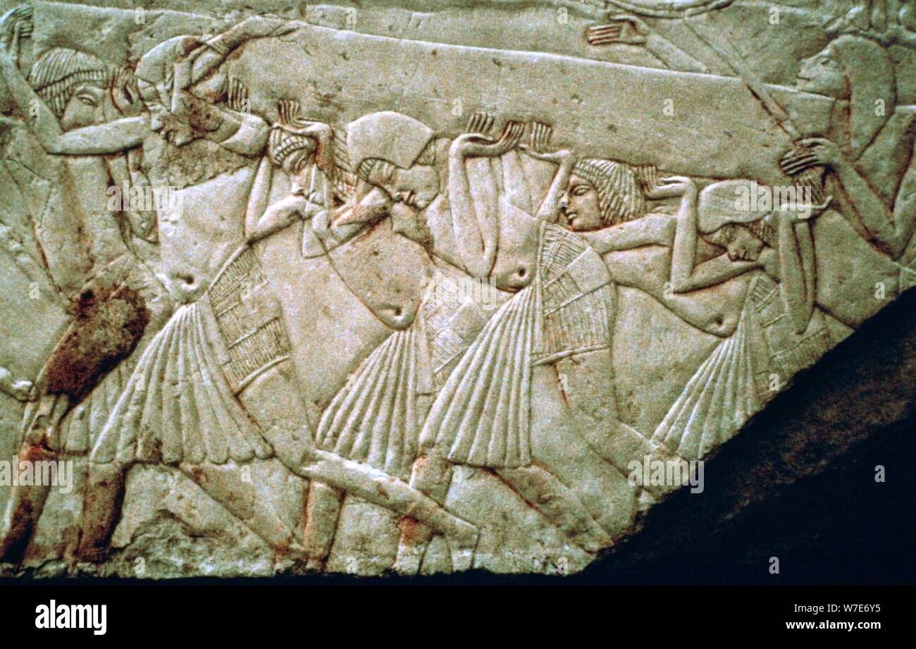 Egyptian relief of men moving a stone lintel. Artist: Unknown Stock ...
