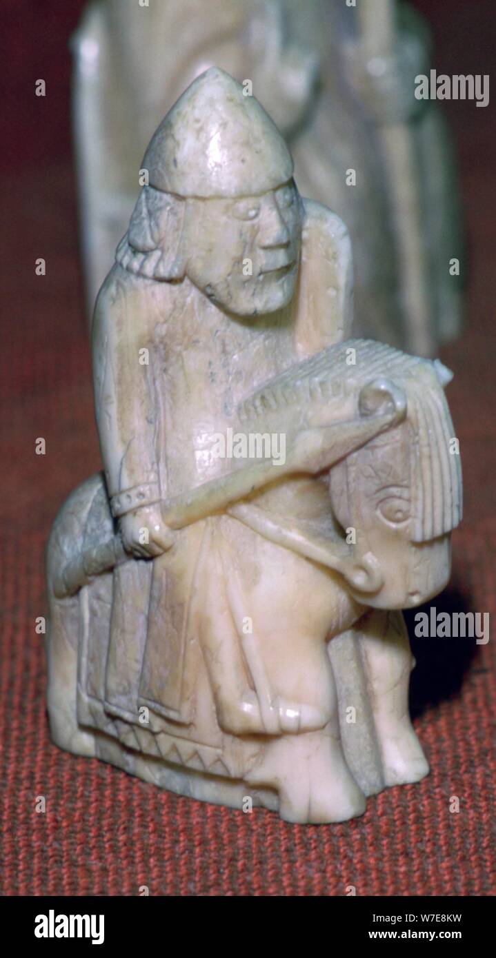 A Knight - The Lewis Chessmen, (Norwegian?), c1150-c1200. Artist ...