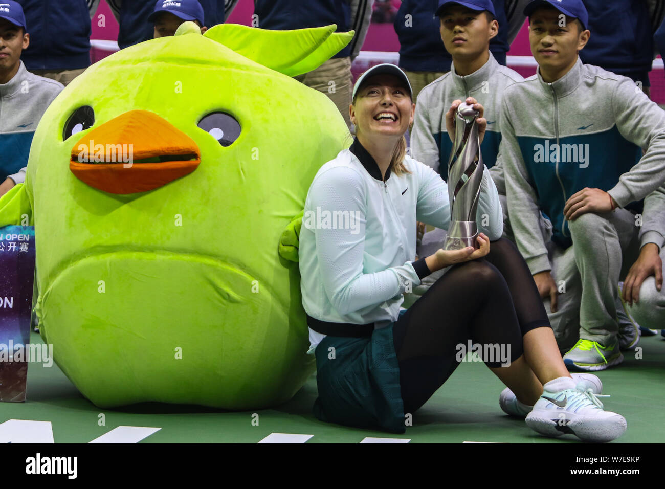 Maria Sharapova of Russia poses with her trophy at the award ceremony ...