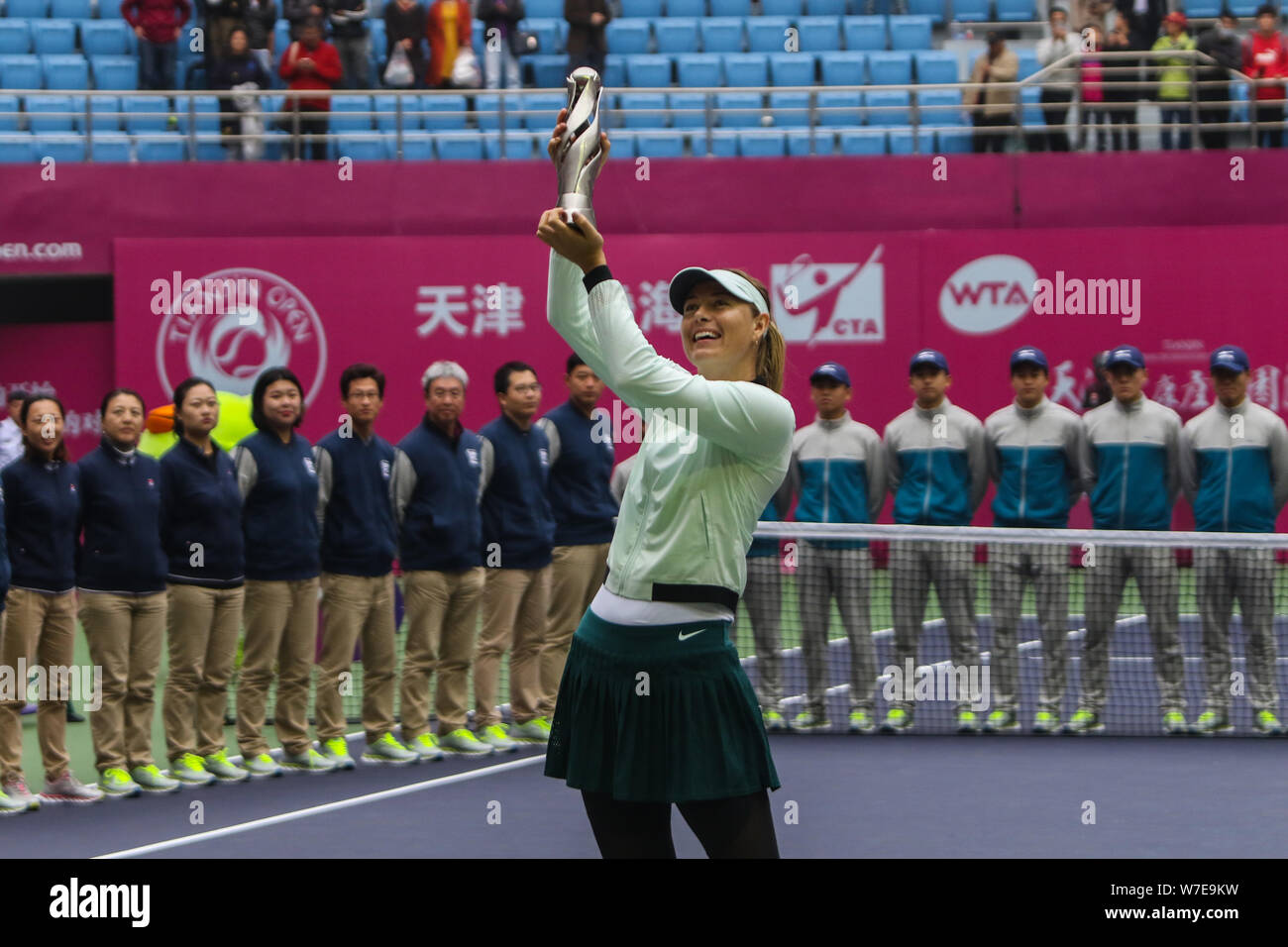 Maria Sharapova of Russia poses with her trophy at the award ceremony ...