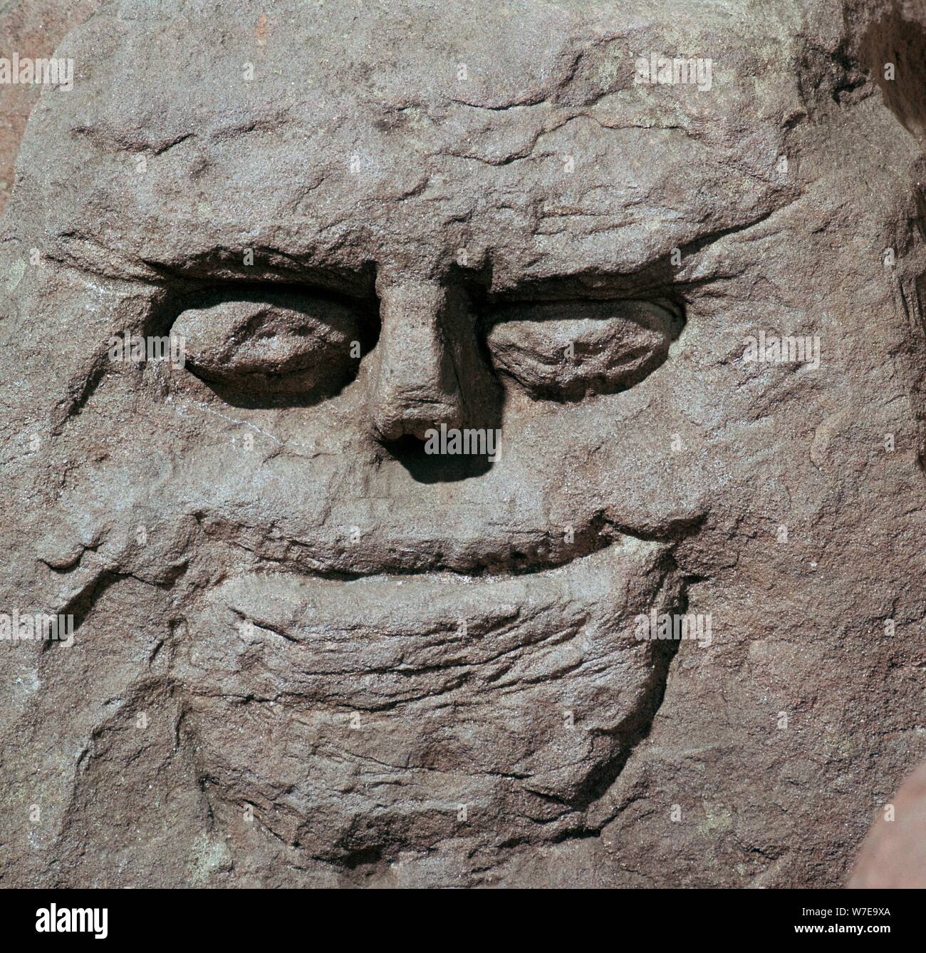 Stone head from a pagan Celtic shrine. Artist: Unknown Stock Photo - Alamy