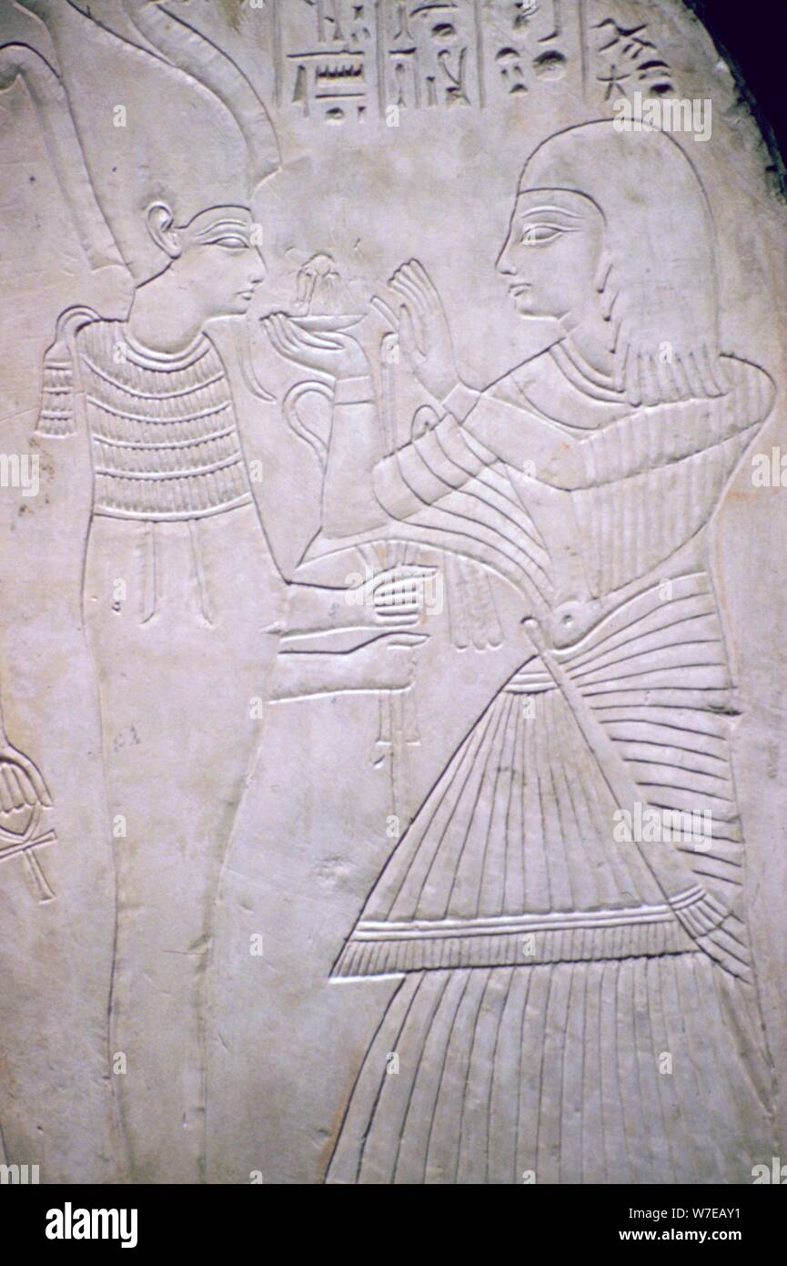 Egyptian relief of Amon making an offering to Osiris. Artist: Unknown ...