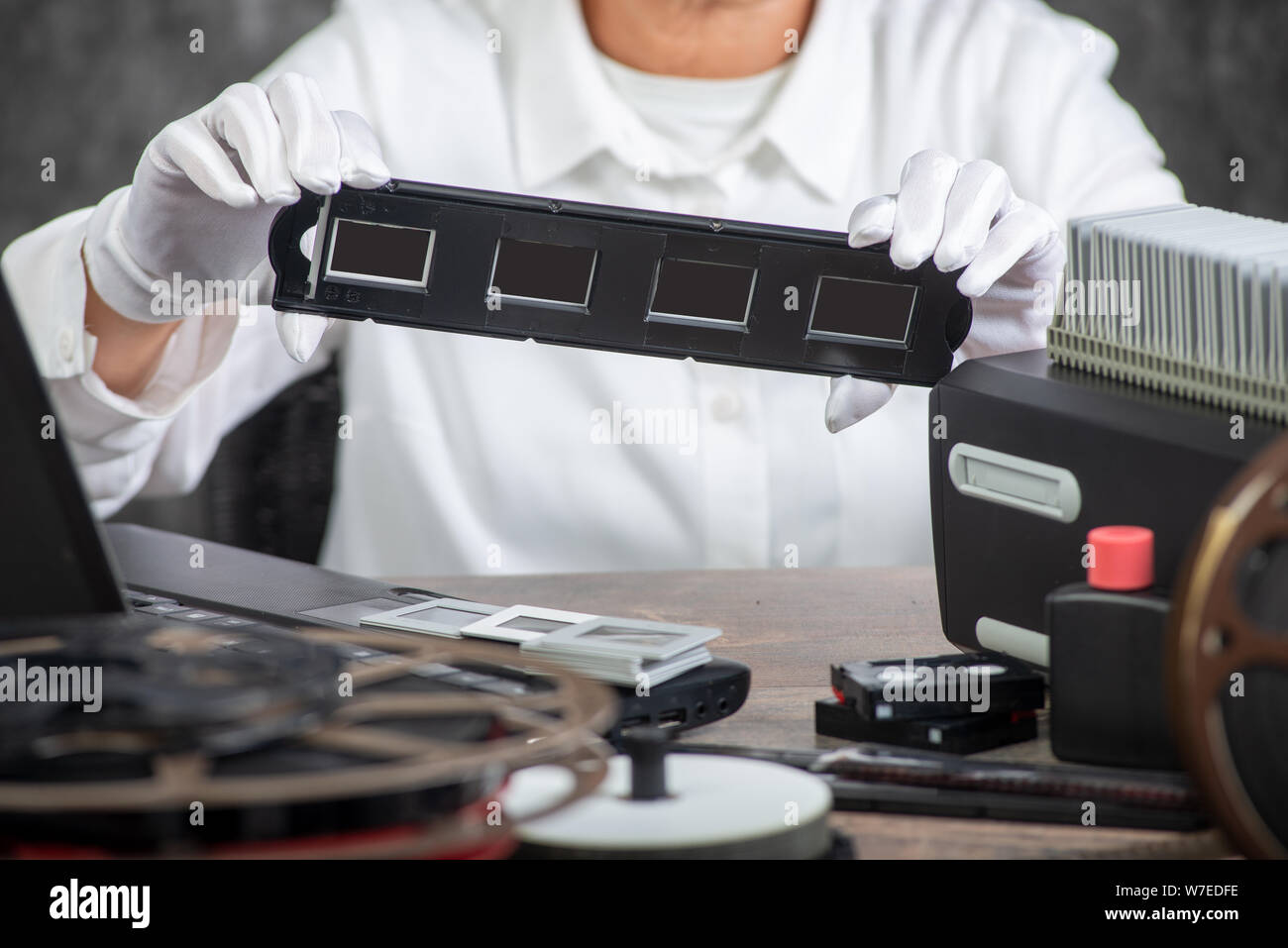 hand photographer digitize a film slide 35mm for saving Stock Photo - Alamy