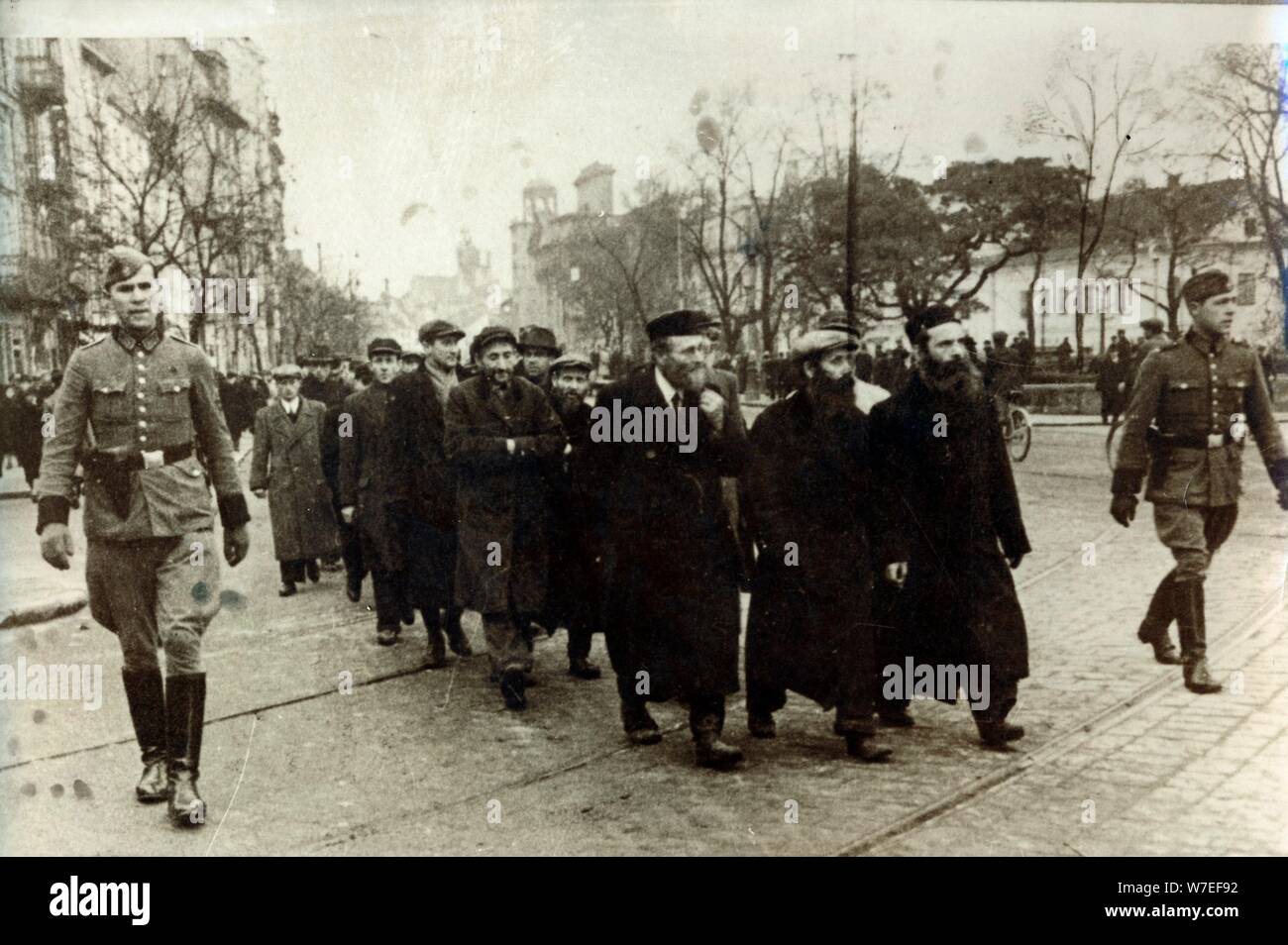 Polish Jews being escorted by German soldiers and Gestapo, Poland ...
