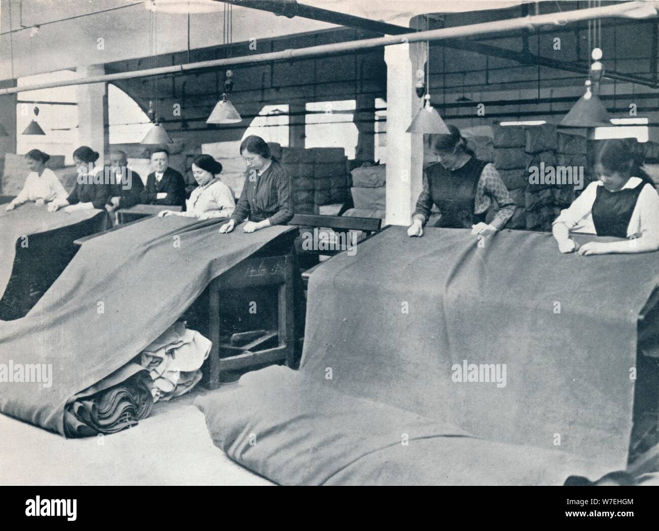 The Making of khaki: examining the finished cloth, c1914 Stock Photo ...