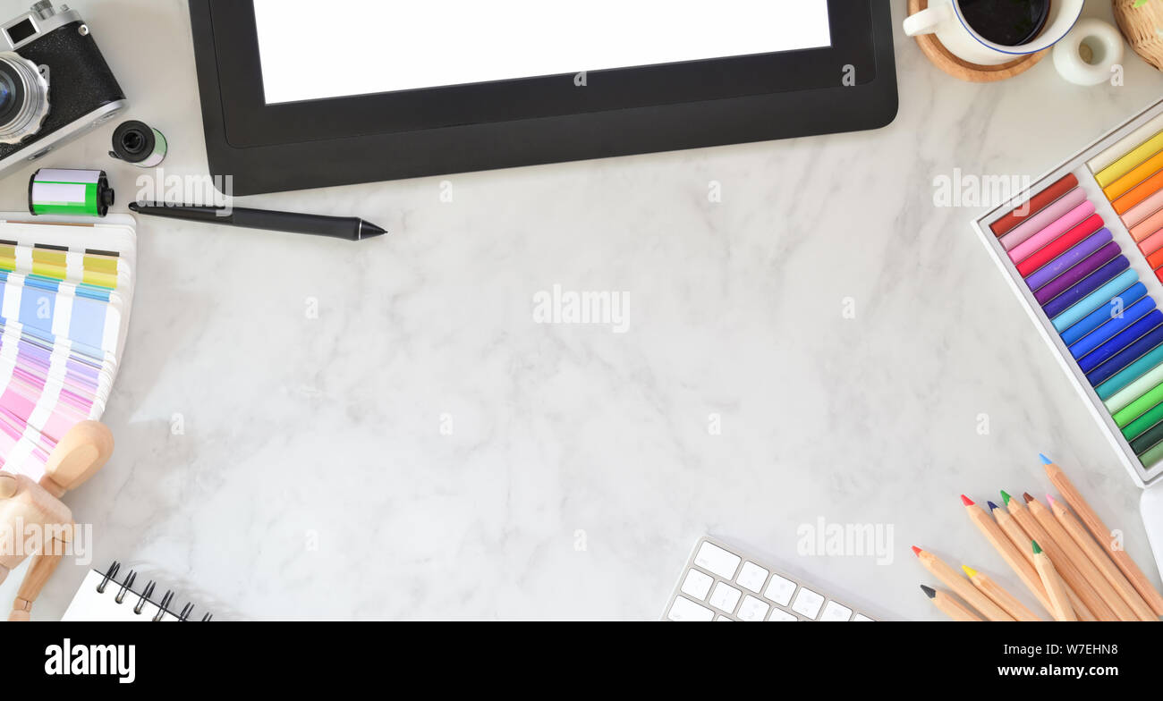 Top view of passionate graphic designer workplace with stationery on ...