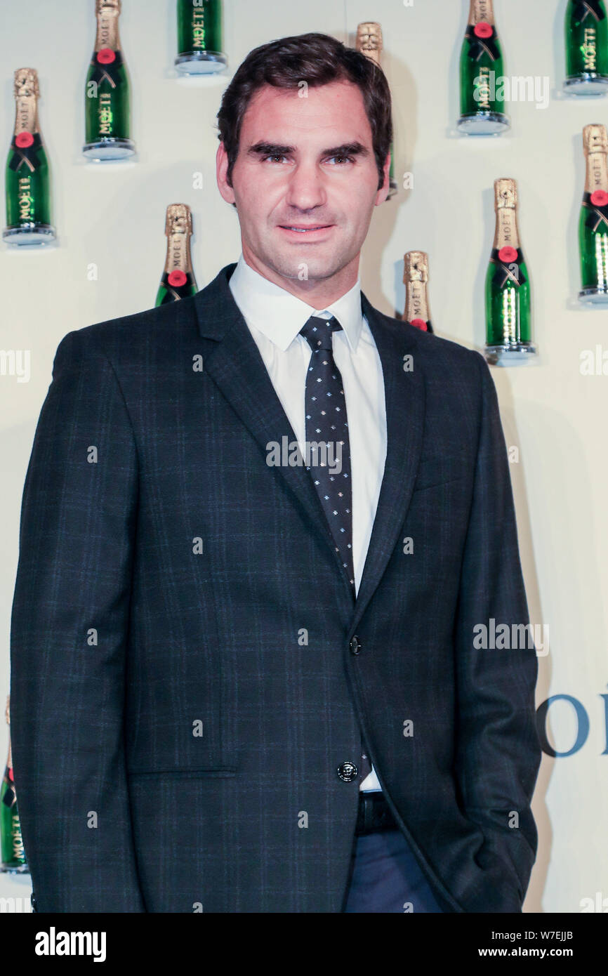 Swiss tennis player Roger Federer poses at the Moet and Chandon Party ...