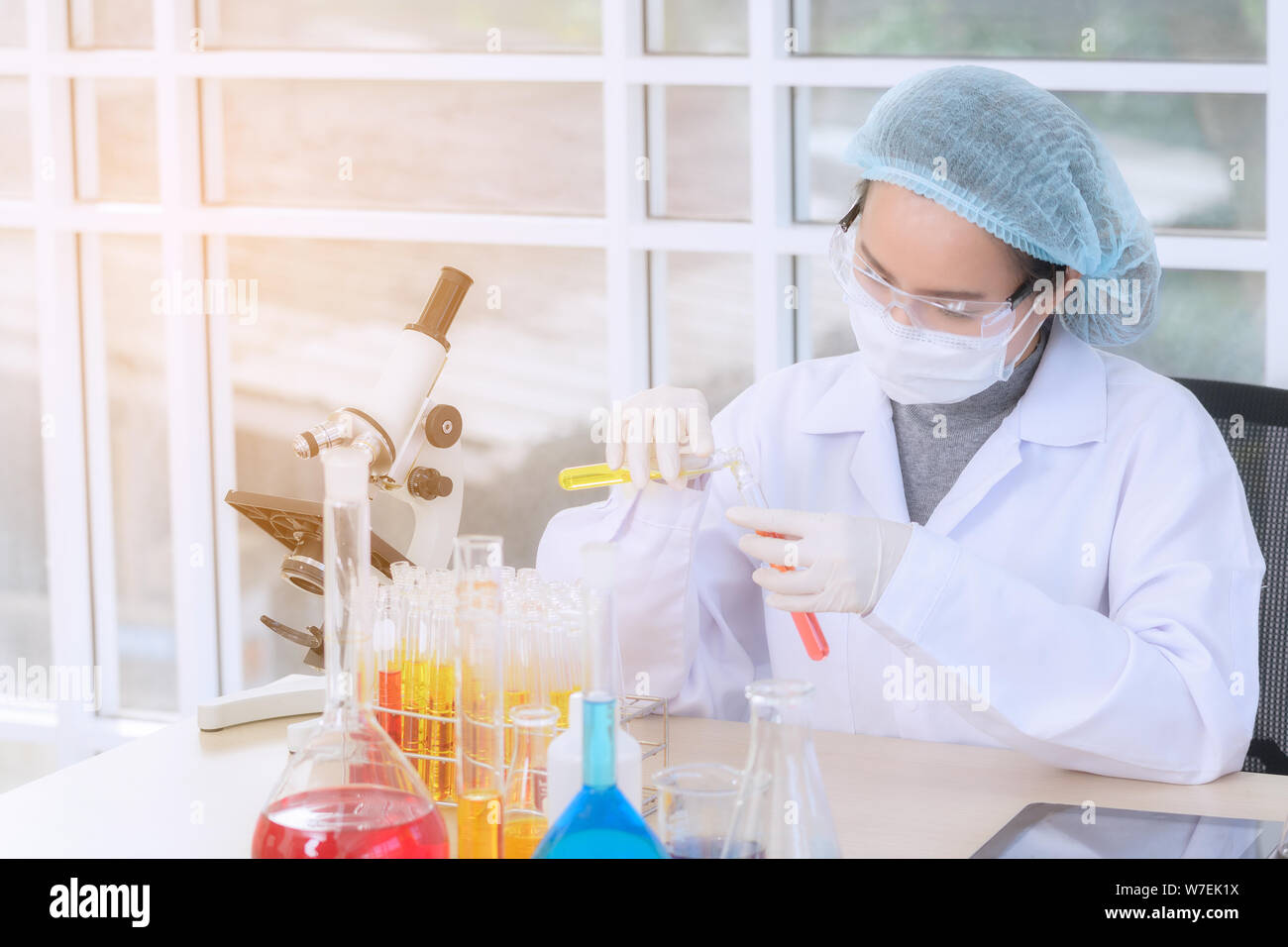 Chemistry class student doing experiment hi-res stock photography and ...