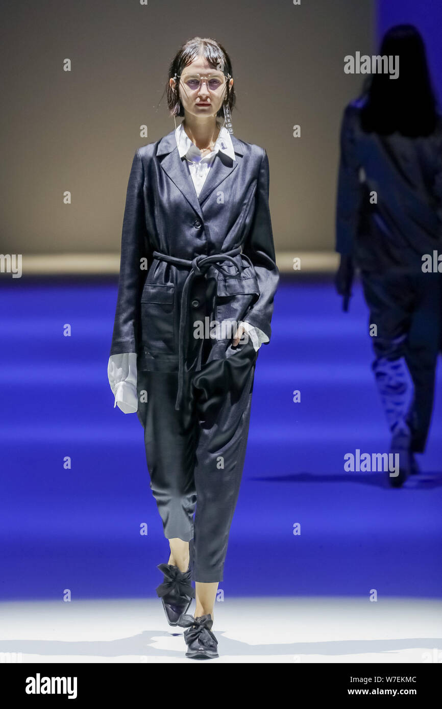 A model displays a new creation at the fashion show of Lanneret during ...