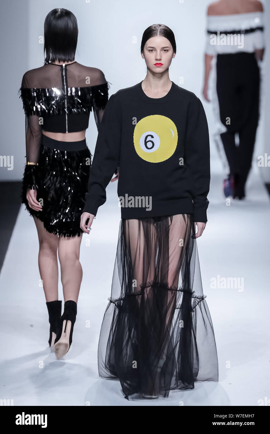 A model displays a new creation at the fashion show of ZHANG SHUAI x JD ...