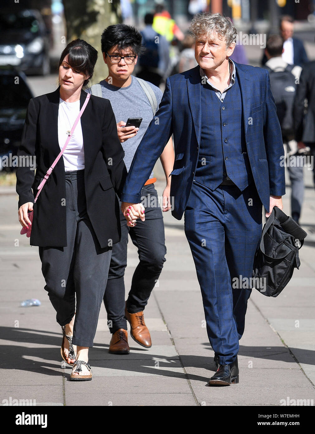 Emmerdale actor Mark Jordon (right) and his partner Laura Norton arrive ...