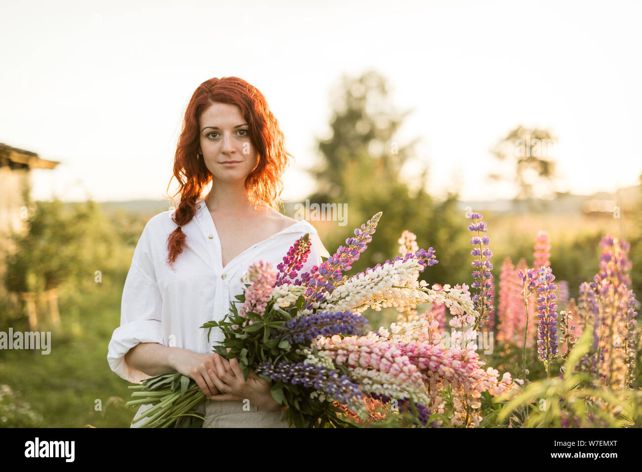 Flowers in girls hands hi-res stock photography and images - Alamy