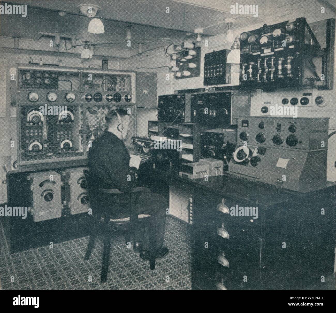 'A Marconi wireless operator receiving wireless messages as the Empress ...