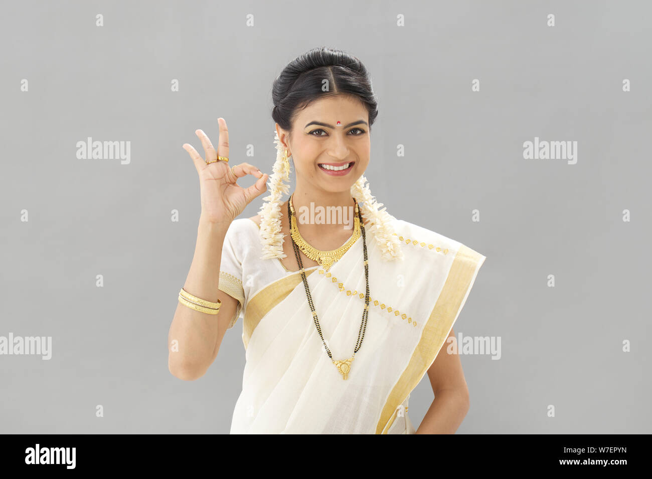 Woman showing ok sign hi-res stock photography and images - Alamy