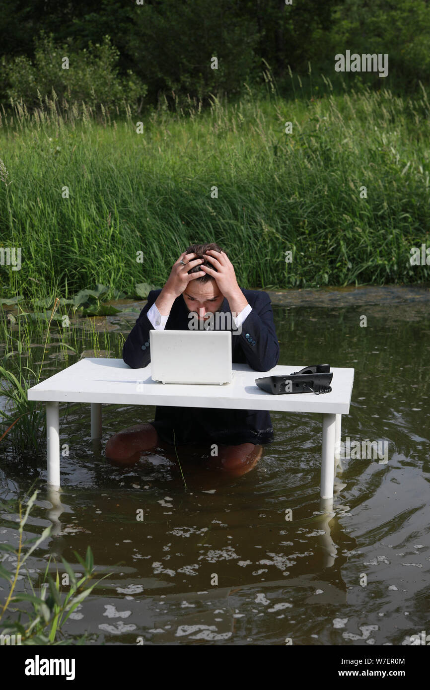 Entrepreneur disappointed work fail standing hi-res stock photography ...