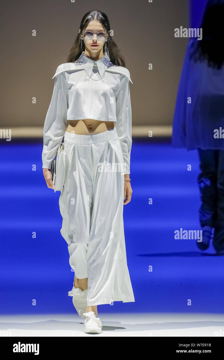 A model displays a new creation at the fashion show of Lanneret during ...