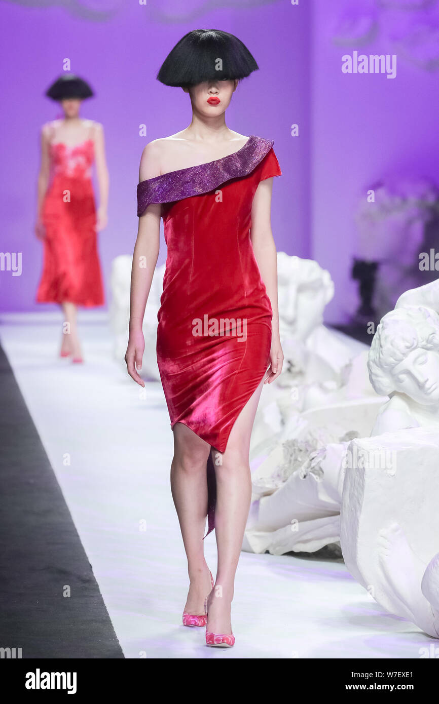 A model displays a new creation at the fashion show of JI CHENG during ...