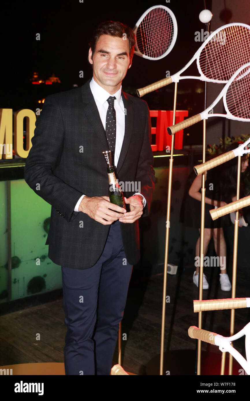 Swiss tennis player Roger Federer poses at the Moet and Chandon Party ...