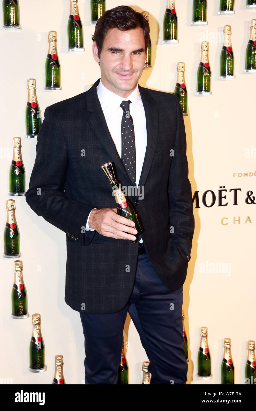 Swiss tennis player Roger Federer poses at the Moet and Chandon Party ...