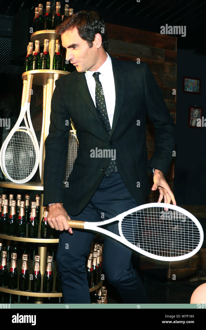 Swiss tennis player Roger Federer poses at the Moet and Chandon Party ...