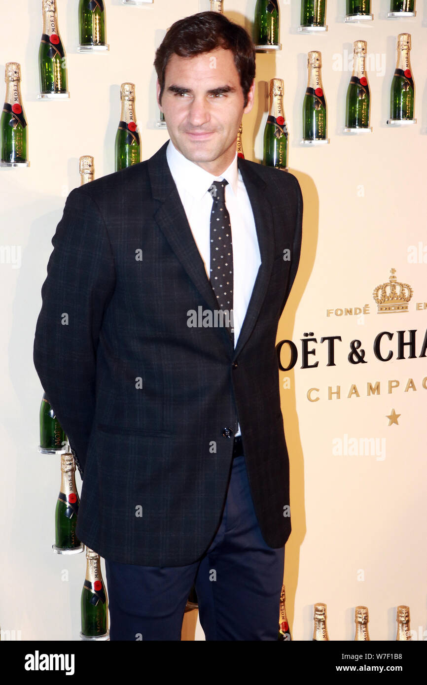 Swiss tennis player Roger Federer poses at the Moet and Chandon Party ...