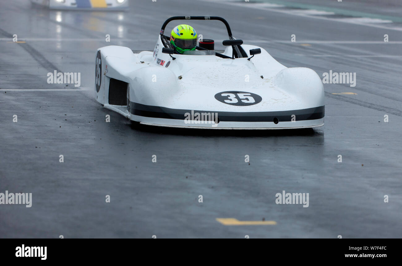 Robert Hall driving his 1986, Shrike P15 down the International Pits ...