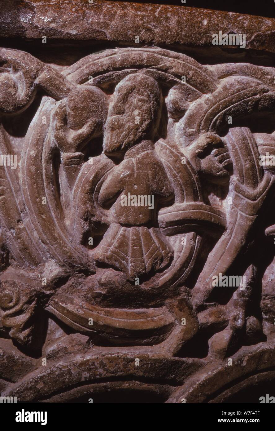 Detail of Norman Font, in 12th century Church within Porchester Castle ...