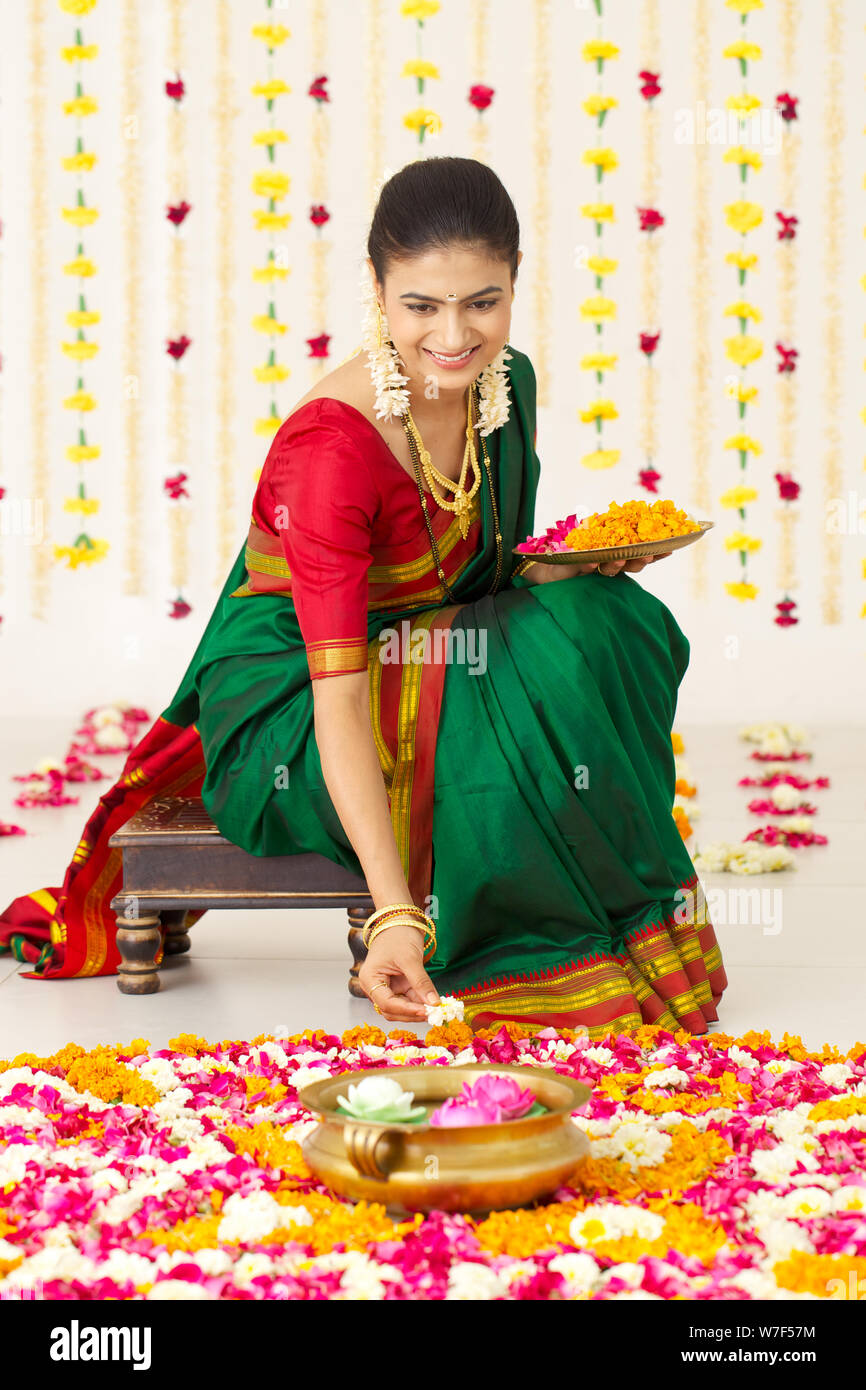 South indian woman making rangoli hi-res stock photography and images ...