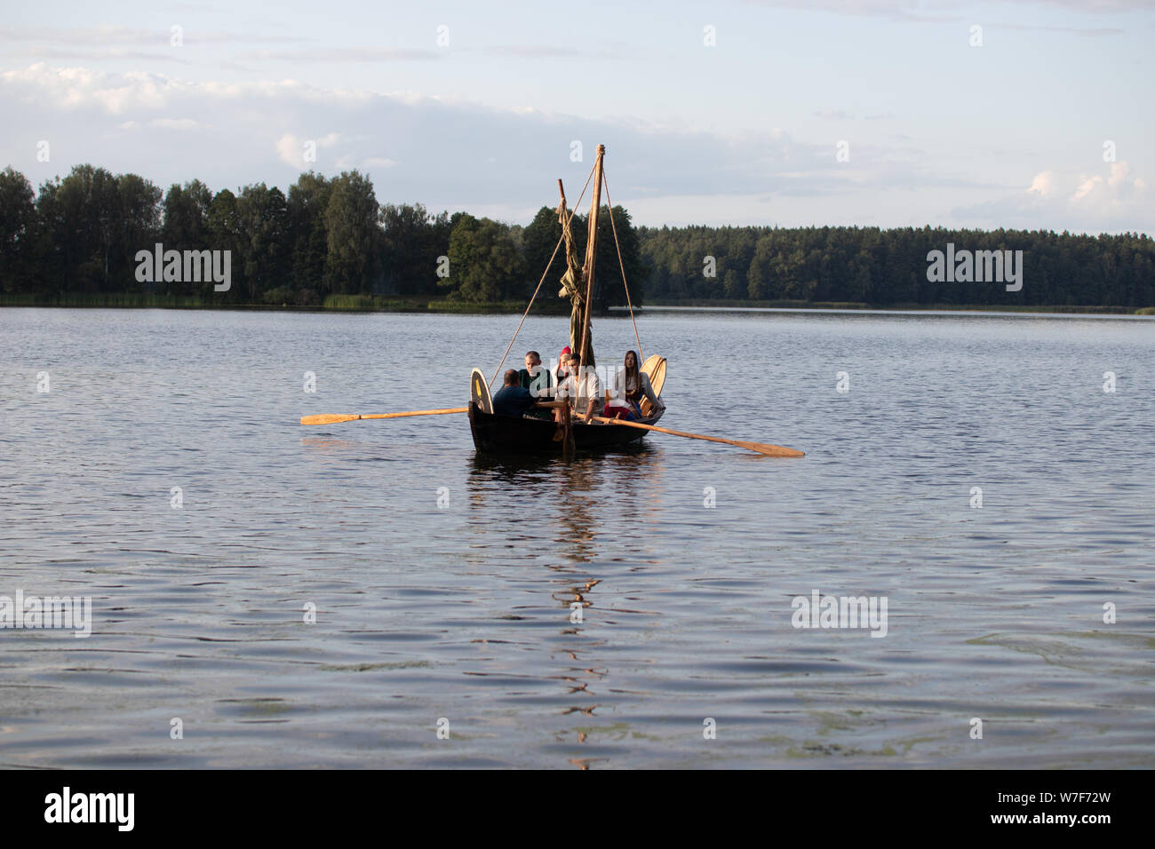 Hike on a sailing and rowing boat on the lake. Lovers of historical ...