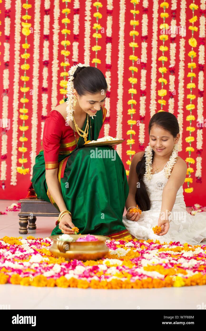 Indian girls design rangoli traditional hi-res stock photography and ...
