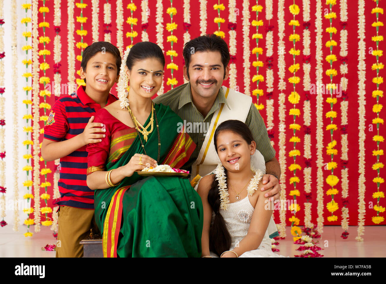 Indian family parents young daughter hi-res stock photography and ...