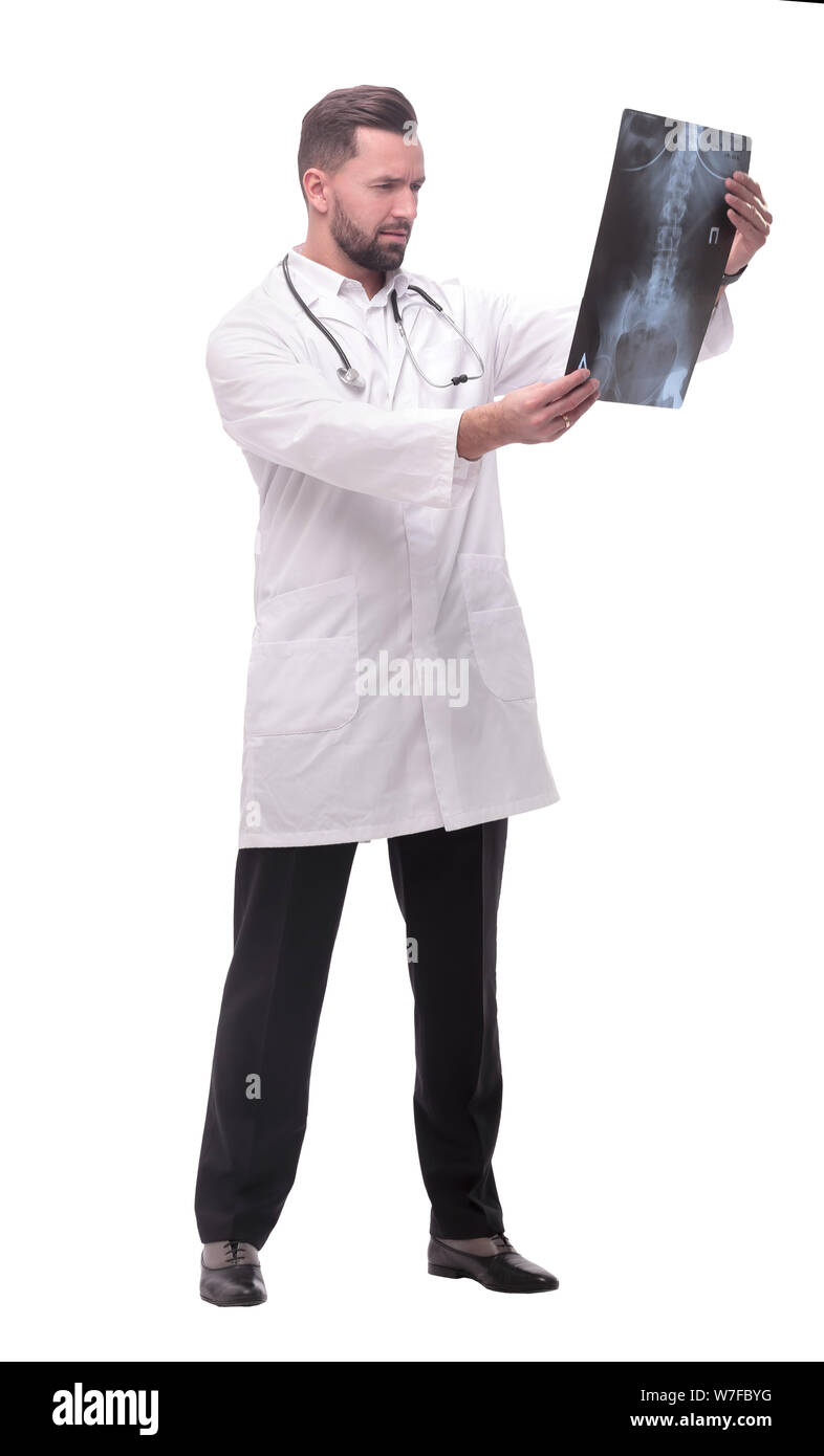in full growth. medical doctor looking closely at the x-ray Stock Photo ...