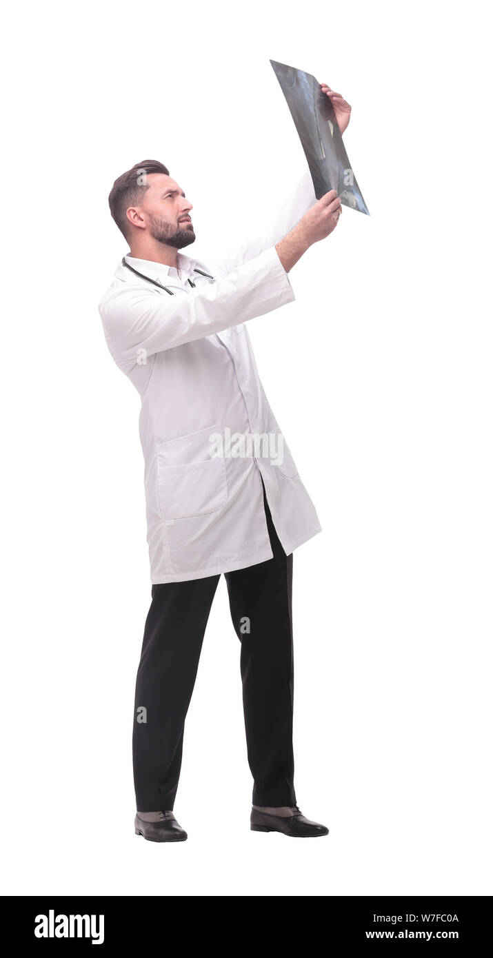 in full growth. medical doctor looking closely at the x-ray Stock Photo ...