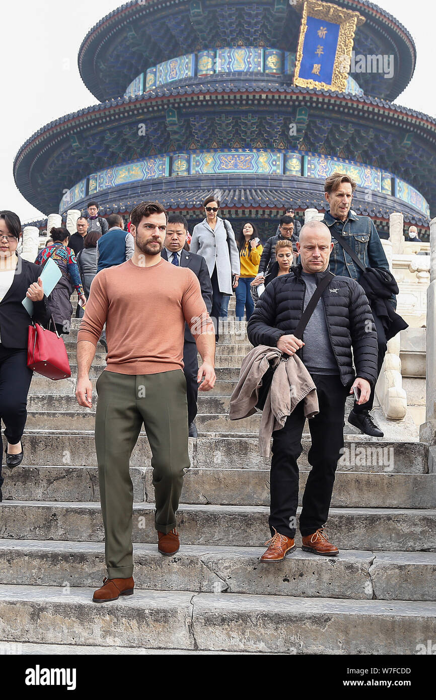 British actor Henry Cavill, left, visits the Temple of Heaven in heavy ...