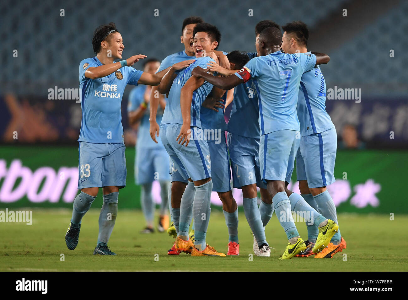 Players of Jiangsu Suning celebrate after scoring a goal against ...