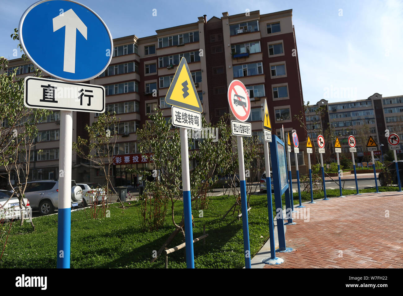 View of the road warning signs arrayed along a 50-meter-long road at a ...