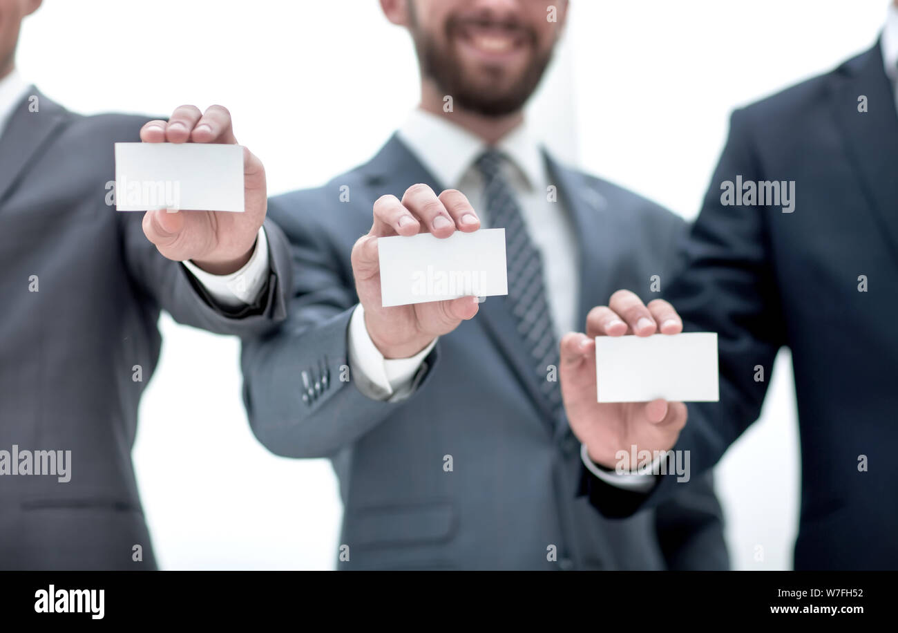 business people showing their business cards Stock Photo - Alamy