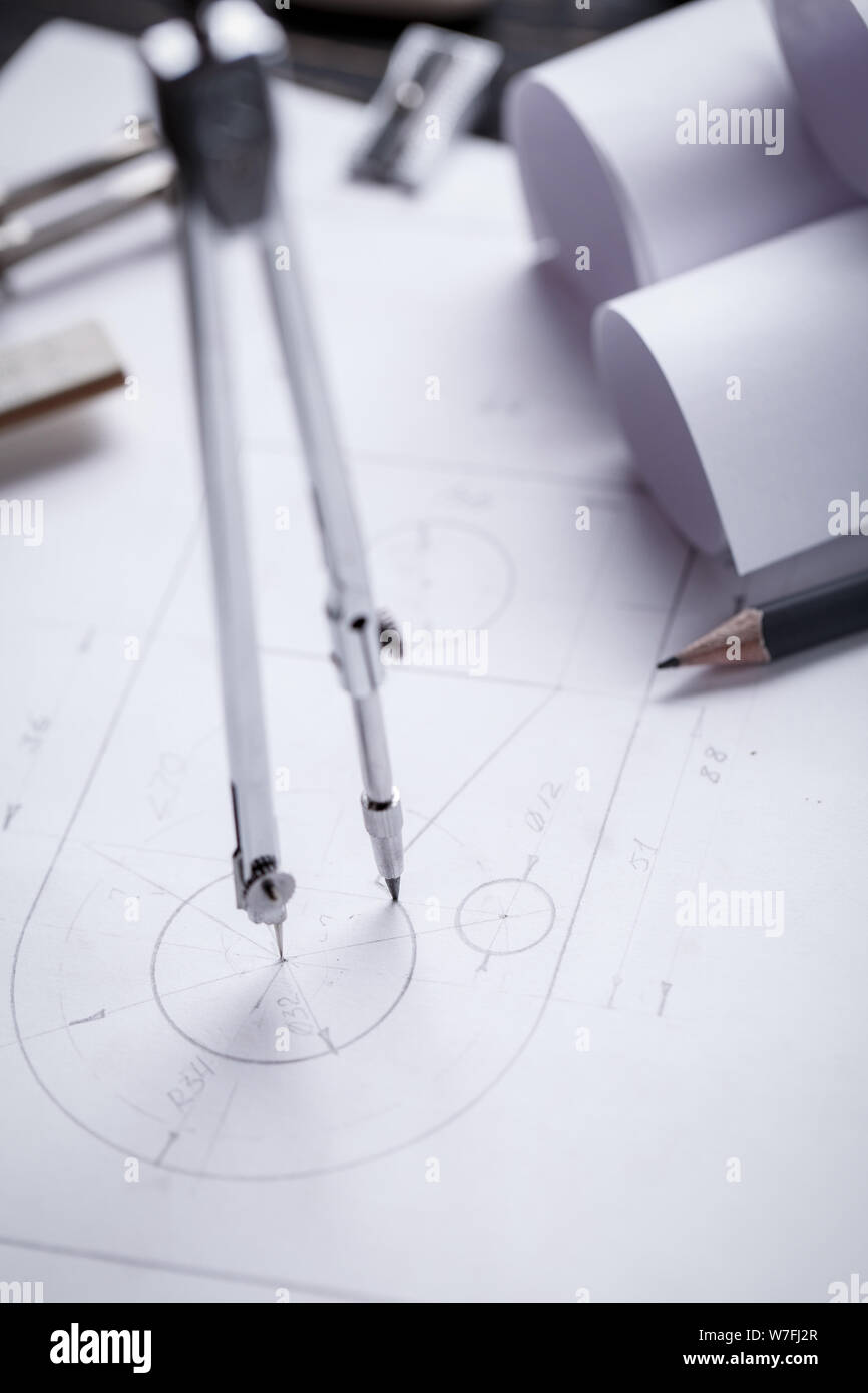 Architectural project, blueprints, blueprint rolls and divider compass ... Architectural project, blueprints, blueprint rolls and divider compass ...