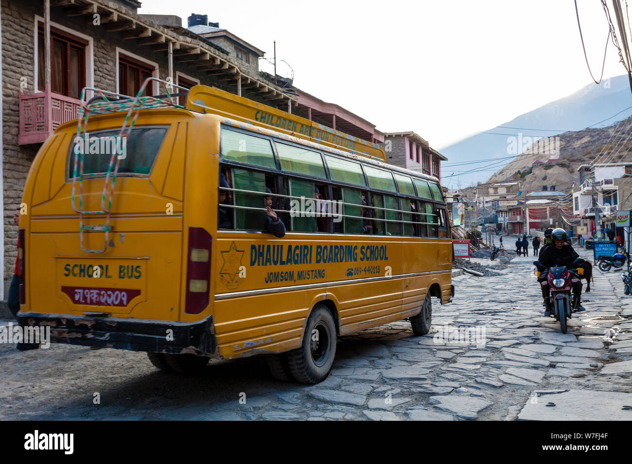 Jomsom, Nepal - November 19, 2015: Children riding a school bus to ...
