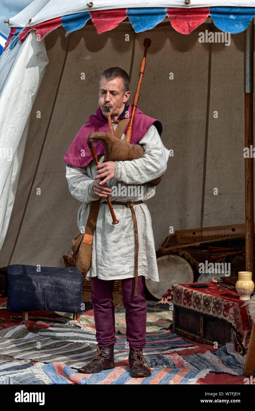 Medieval musicians, pipe and drum group Stock Photo - Alamy