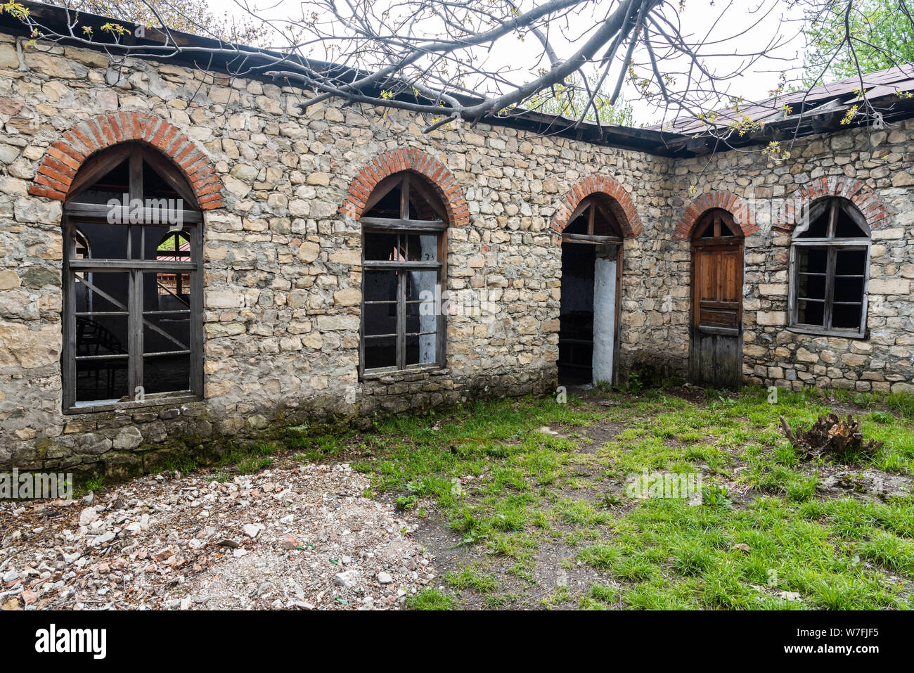 Basqal, Ismayilli region, Azerbaijan - April 30, 2019. Burnt down and ...