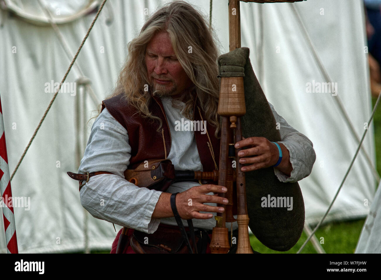 Medieval musicians, piper Stock Photo - Alamy