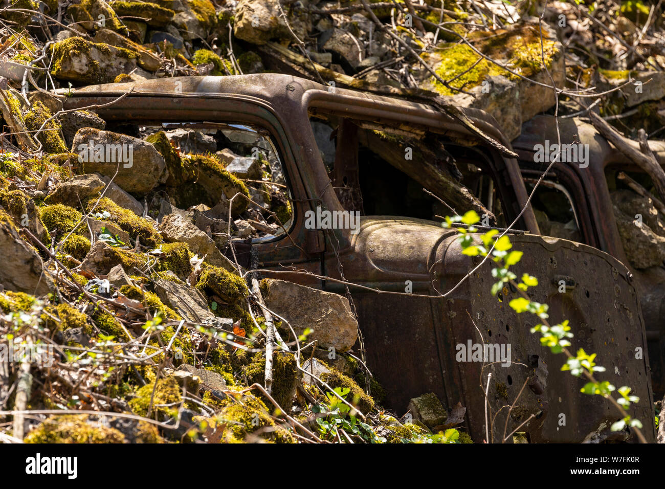 Cars in buried in ground hi-res stock photography and images - Alamy