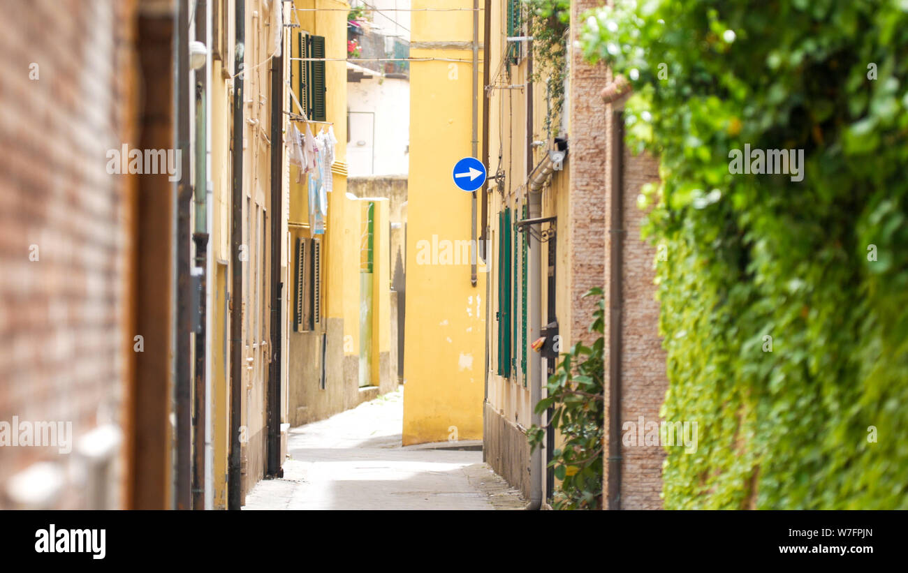 View of the narrow alleys of Pisa. Italy - Architecture concept Stock ...