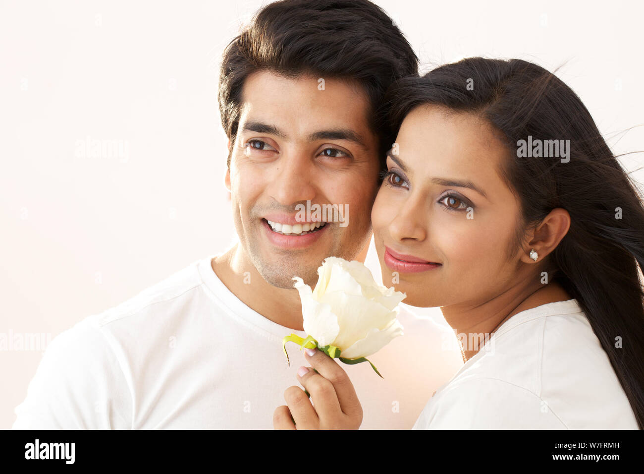 Young couple romancing Stock Photo - Alamy