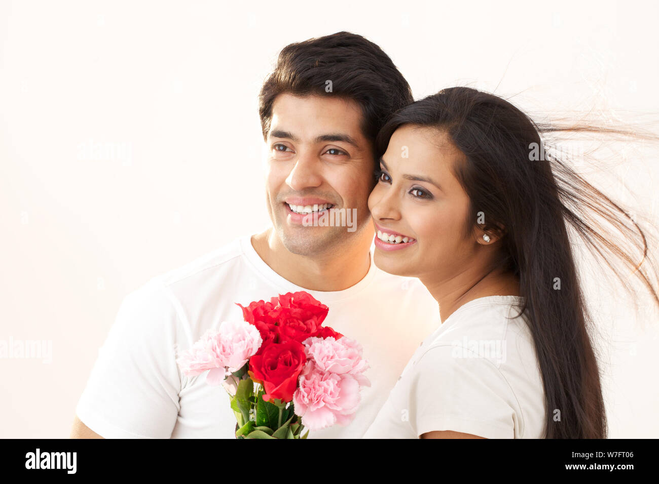 Young couple romancing Stock Photo - Alamy