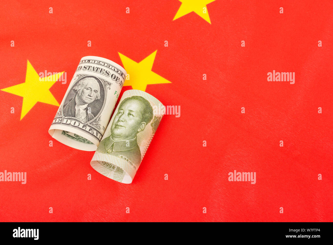 Chinese Yuan Renminbi banknote + U.S One Dollar bill & China flag. For ...