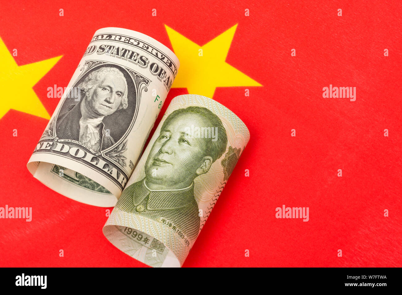 Chinese Yuan Renminbi banknote + U.S One Dollar bill & China flag. For ...