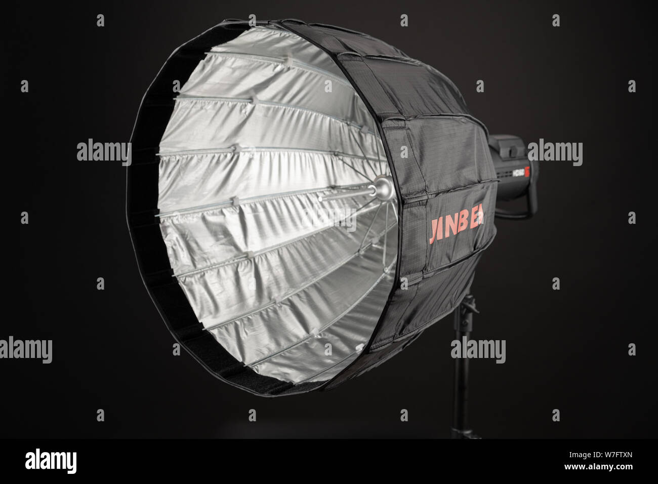 A modern electric saturated black octobox on a tripod. A huge octobox ...