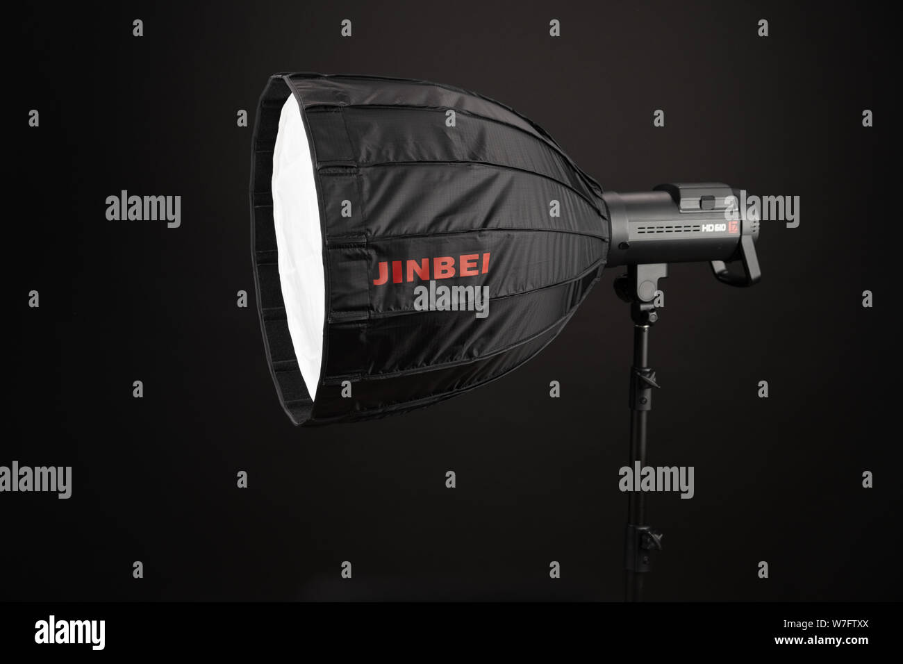 A modern electric saturated black octobox on a tripod. A huge octobox ...